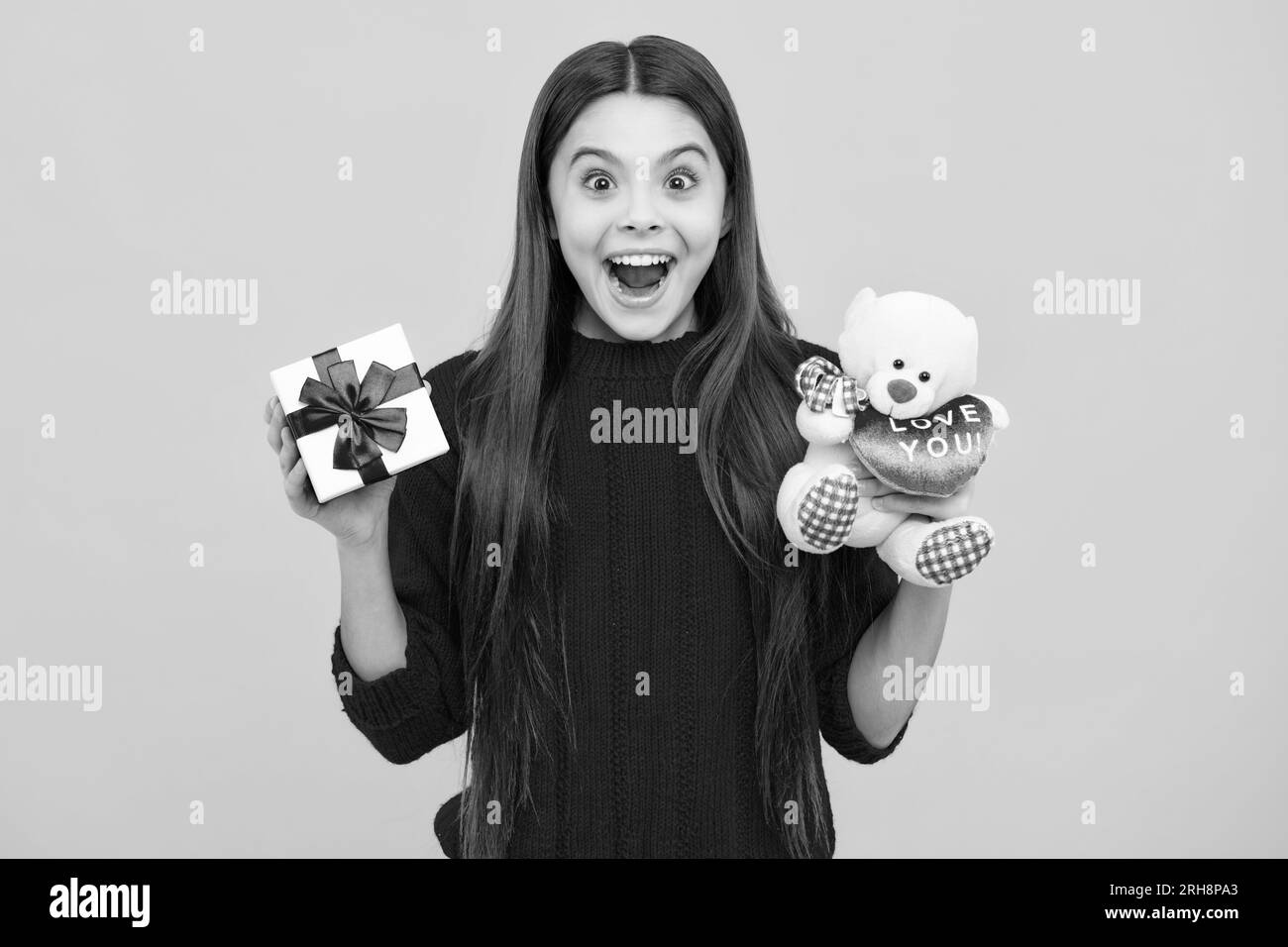 Excited kids face. Teenager child with present box. Teen girl giving ...