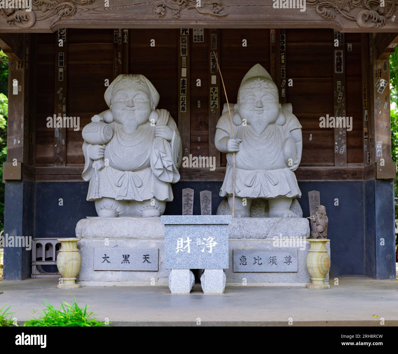 Japanese guardian statues at the traditional street in Tokyo Stock ...