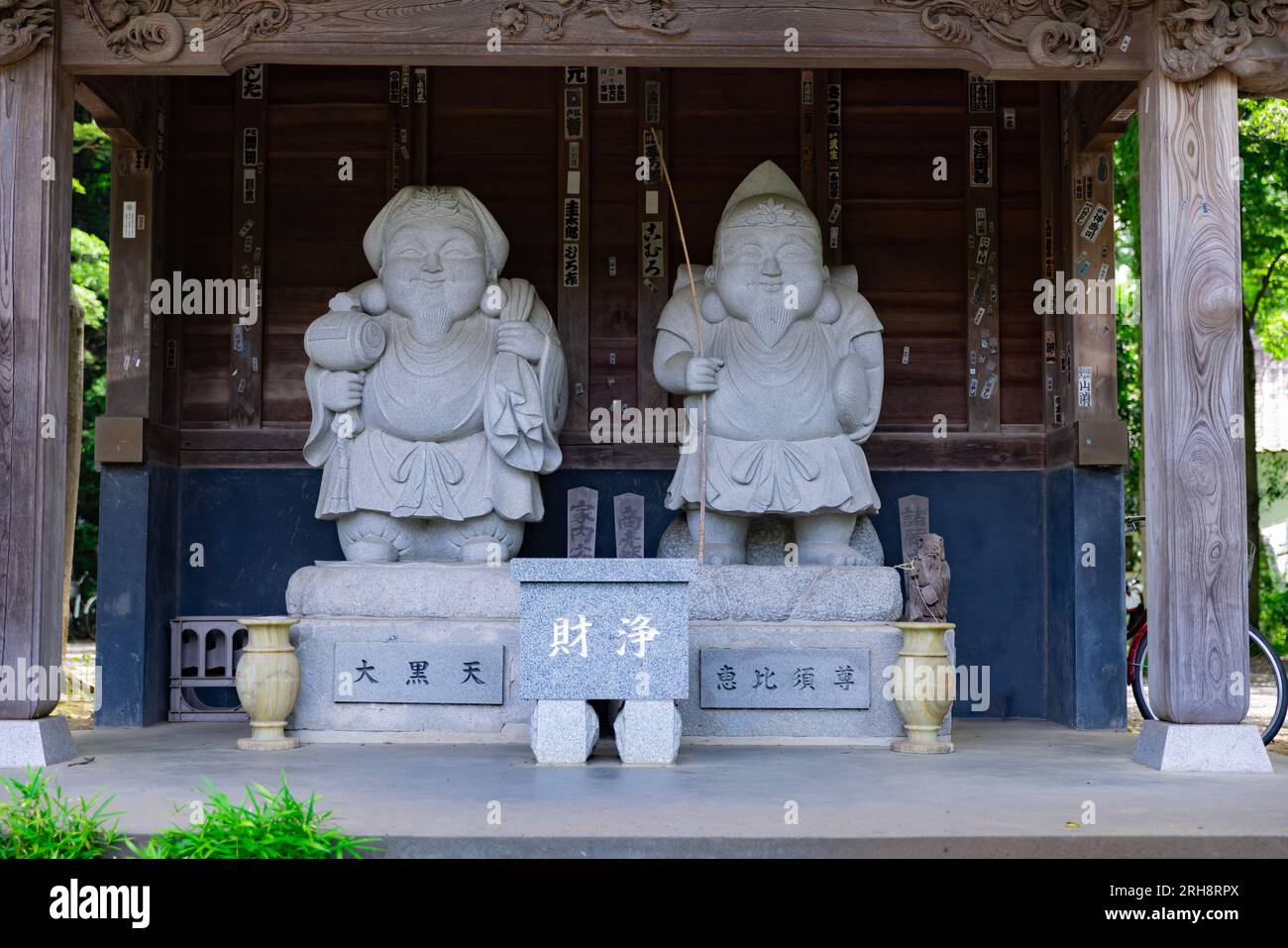 Japanese guardian statues at the traditional street in Tokyo Stock ...