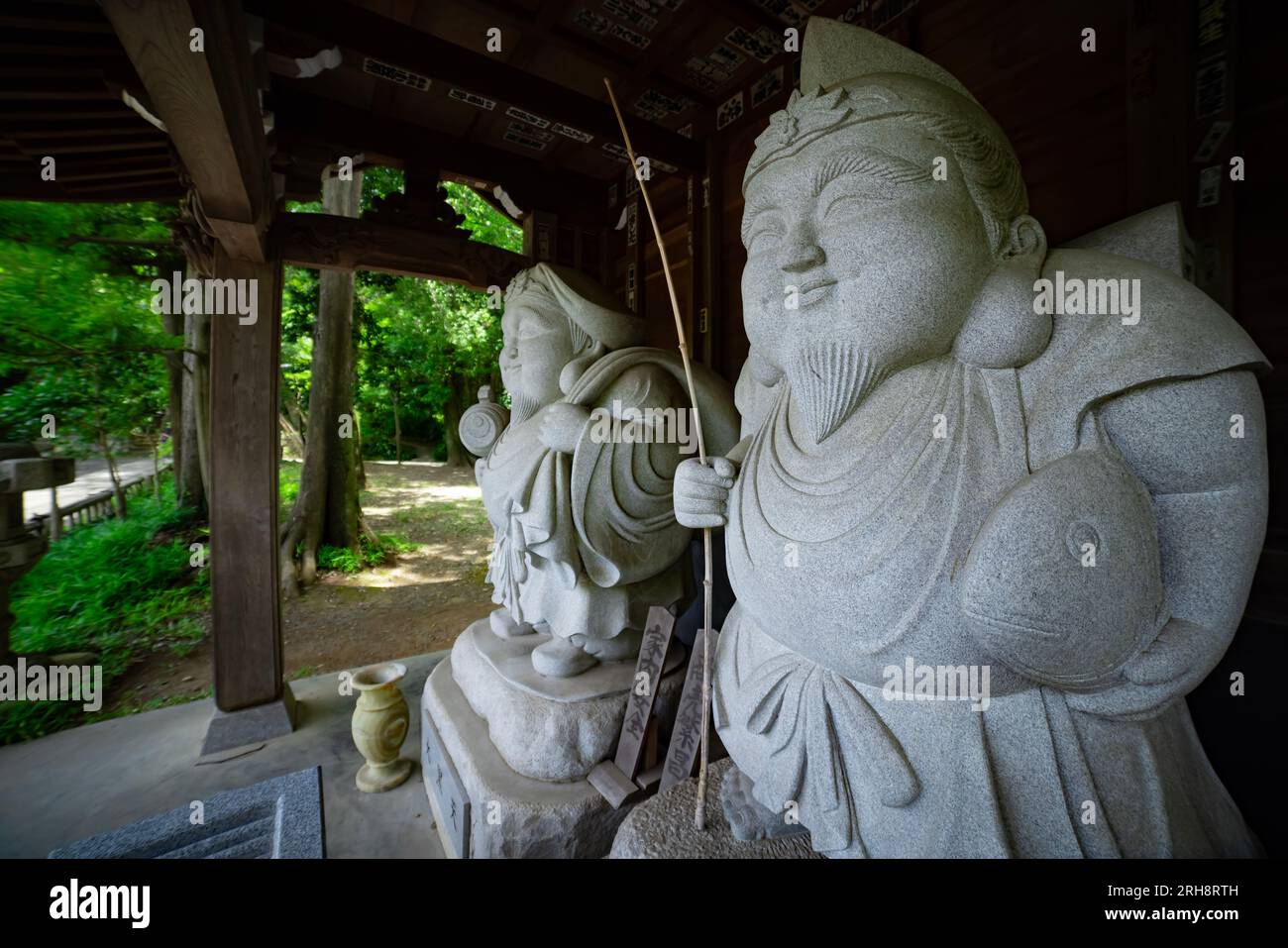 Japanese guardian statues at the traditional street in Tokyo Stock ...