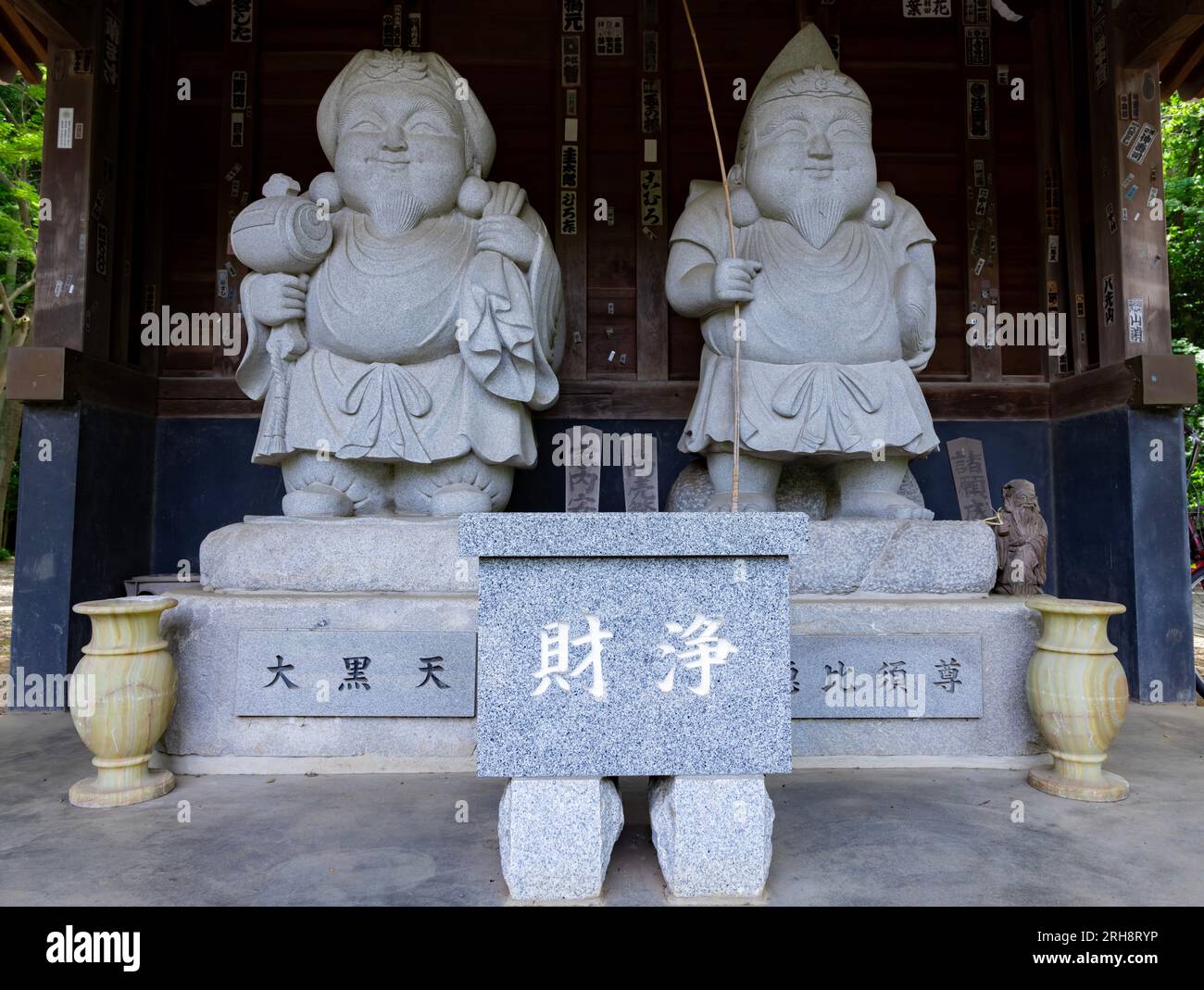Japanese guardian statues at the traditional street in Tokyo Stock ...