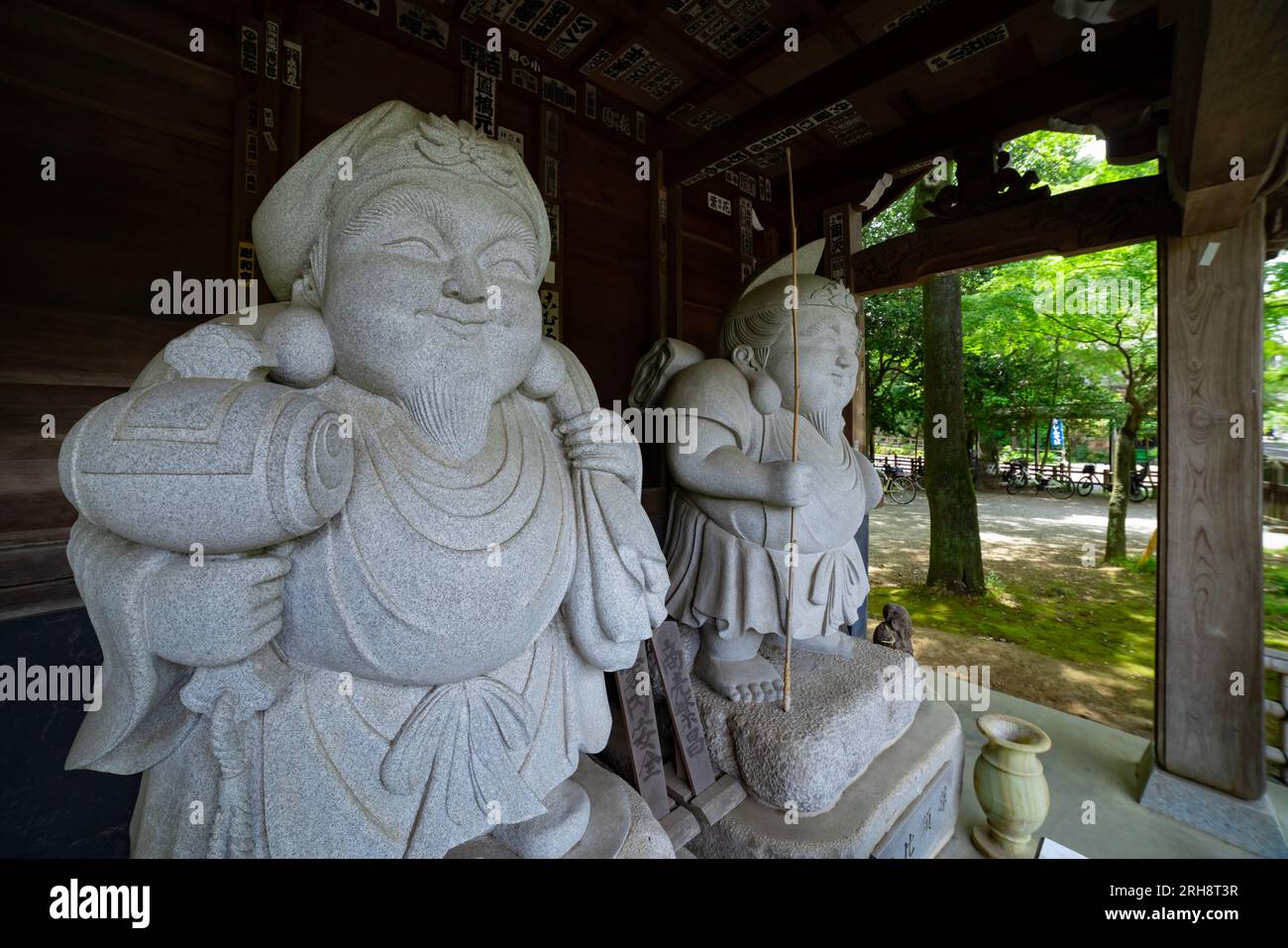 Japanese guardian statues at the traditional street in Tokyo Stock ...