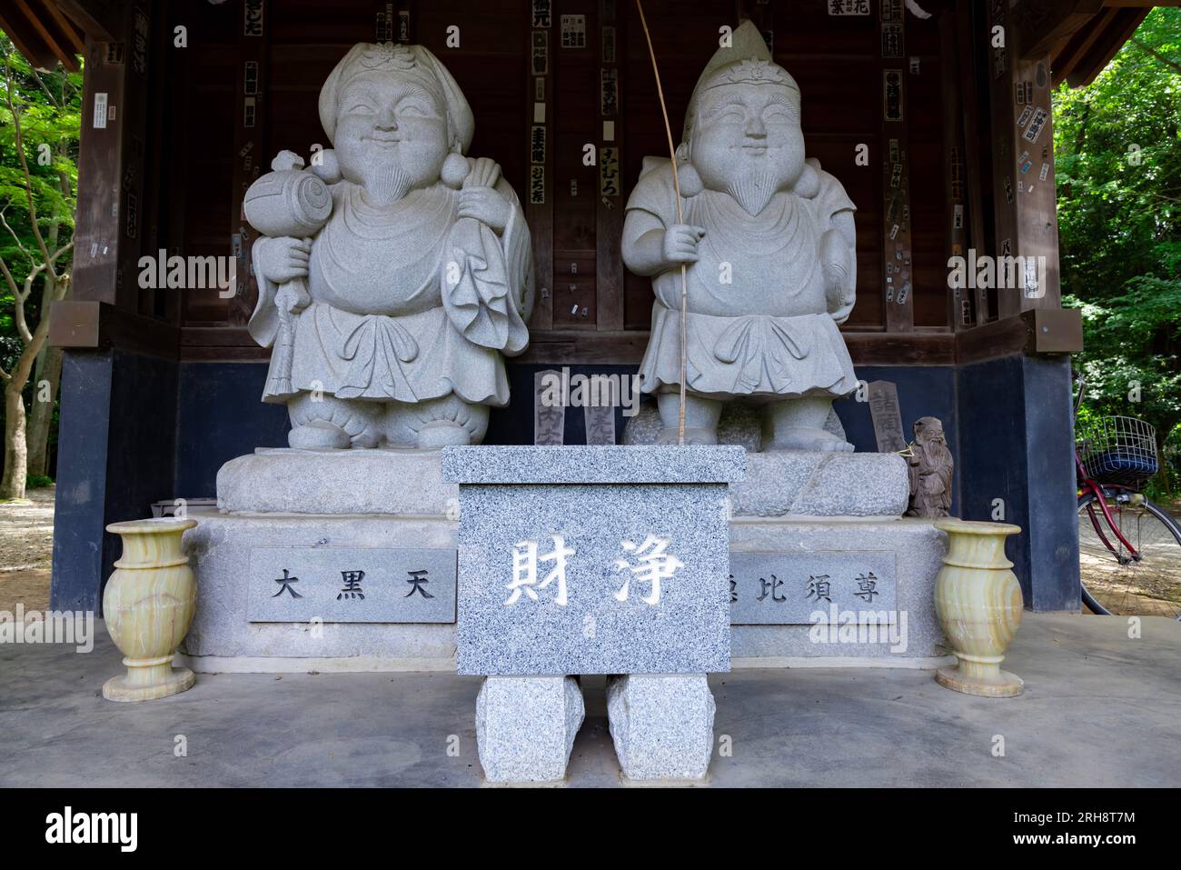Japanese guardian statues at the traditional street in Tokyo Stock ...