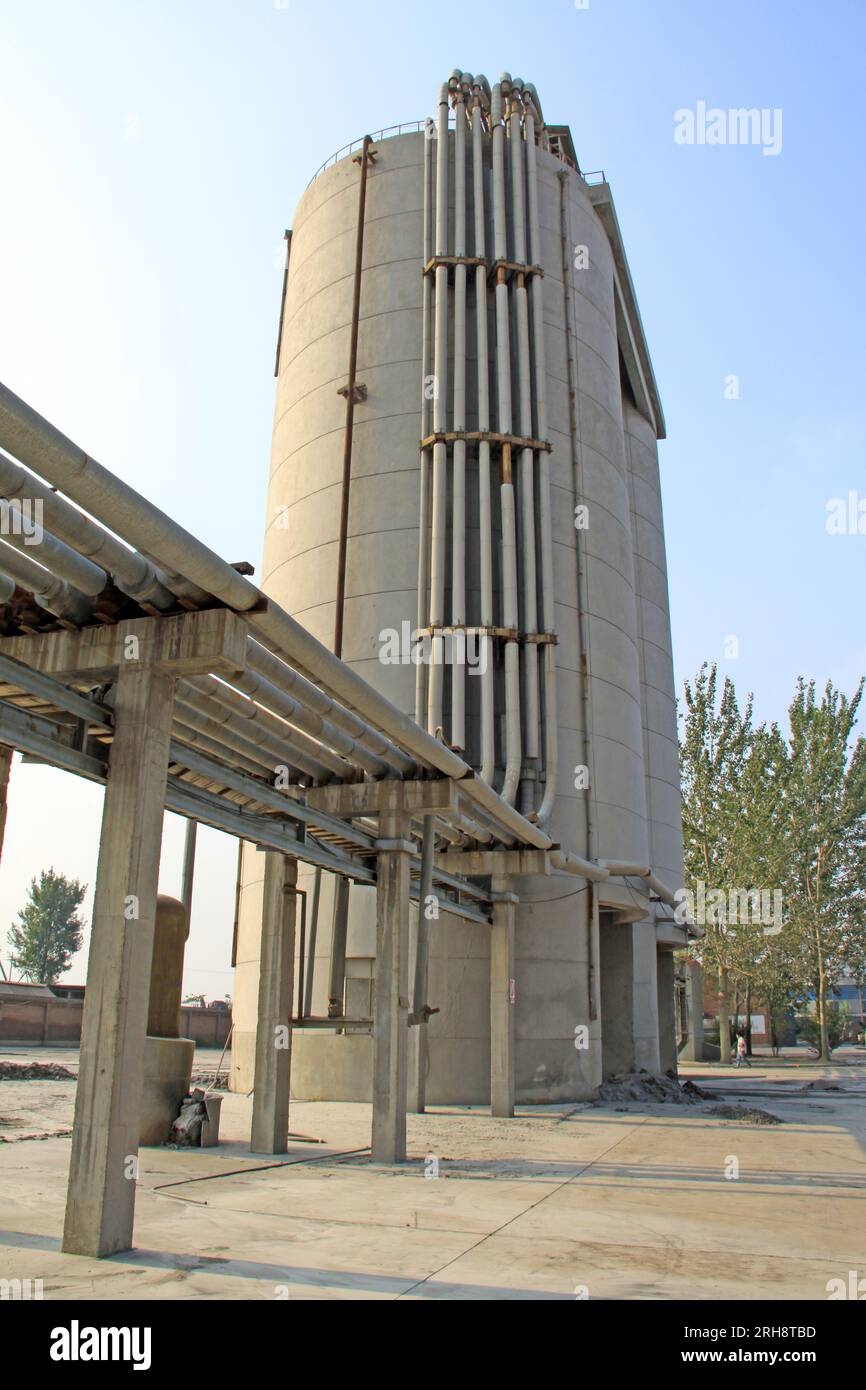 industrial building cooling tower in a factory Stock Photo - Alamy