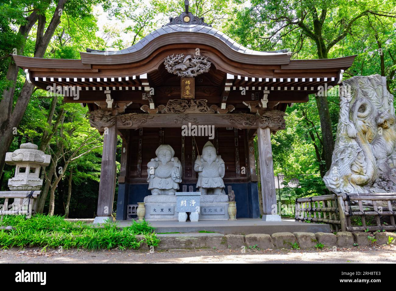 Japanese guardian statues at the traditional street in Tokyo Stock ...