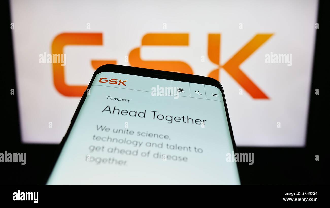 Smartphone with website of British pharmaceutical company GSK plc on ...