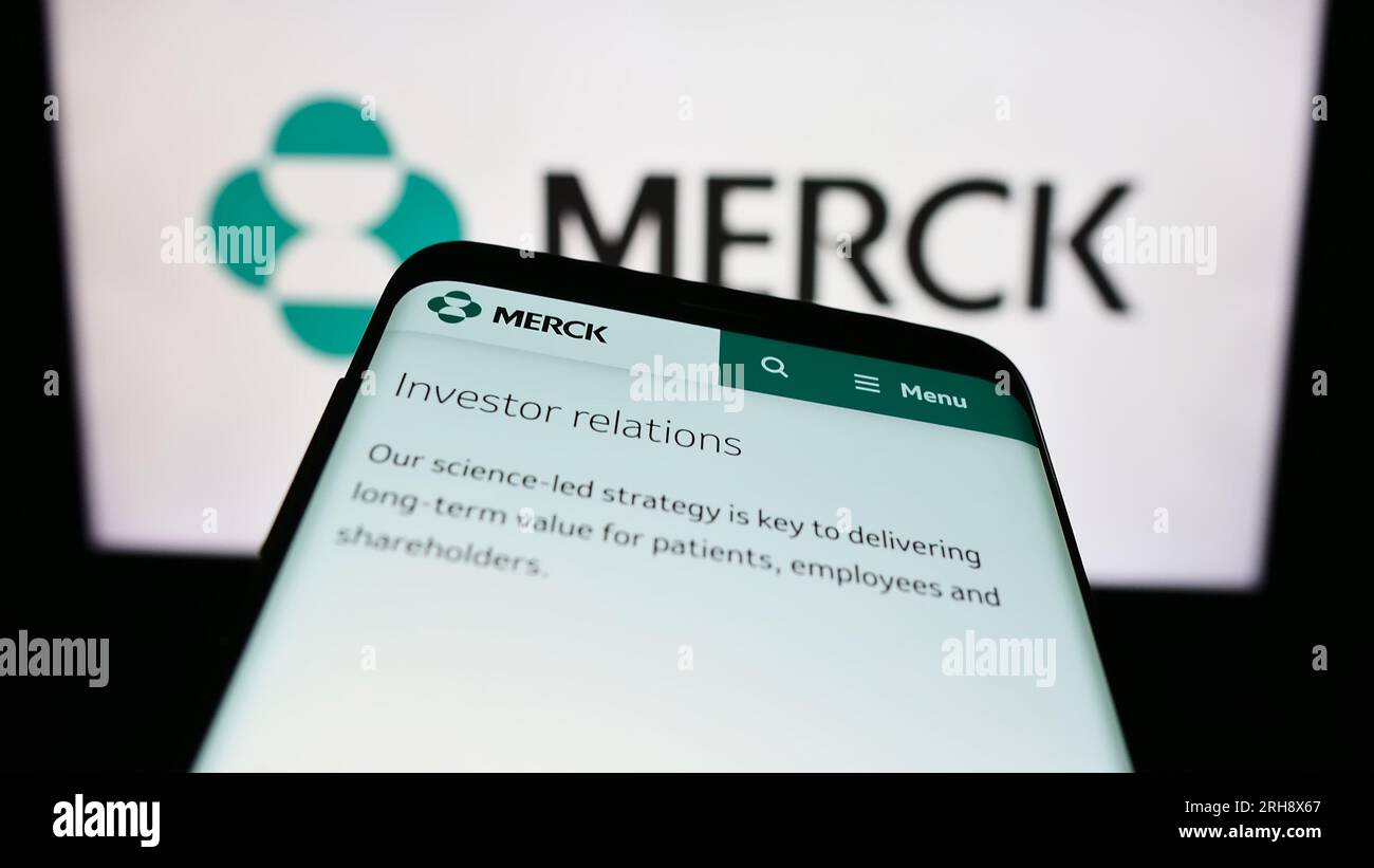 Mobile phone with website of US pharmaceutical company Merck Co. Inc ...