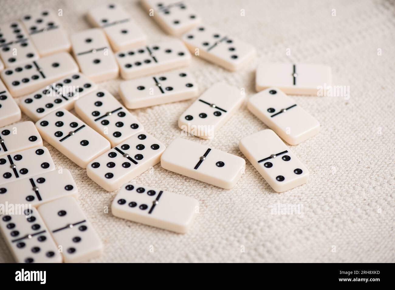 Heap of Domino tiles on the table. Dominoes is one of the most famous ...