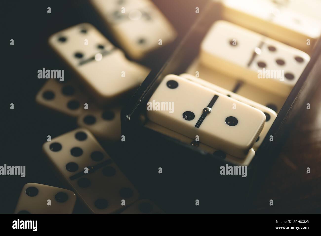Heap of Domino tiles on the table. Dominoes is one of the most famous ...