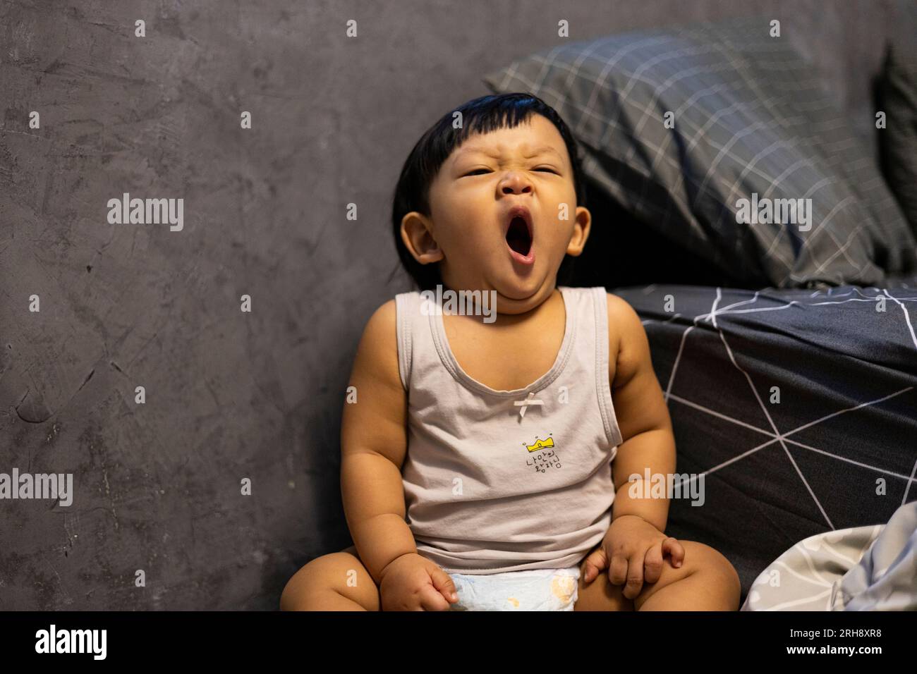 Sleepy Yawning Child, background for the ad and wallpaper in the children and family scene ...