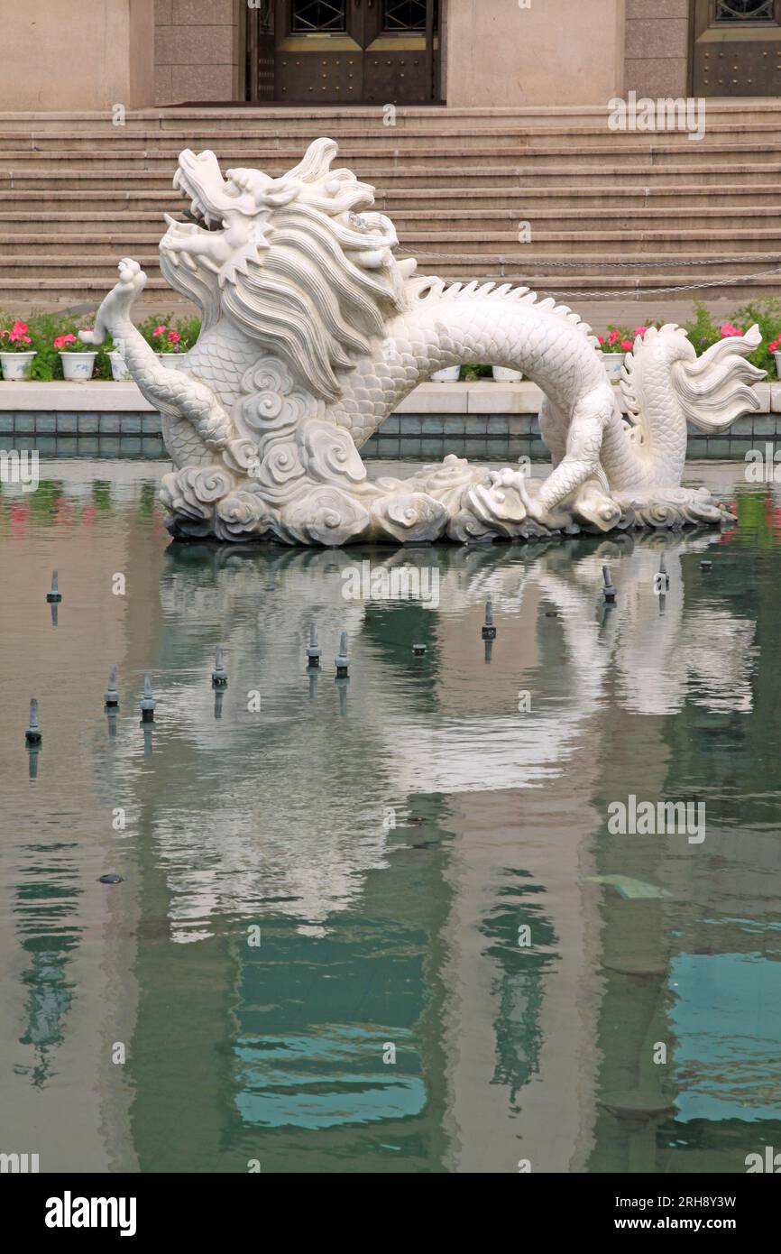 dragon sculpture on the lake in a park, beijing, china Stock Photo - Alamy