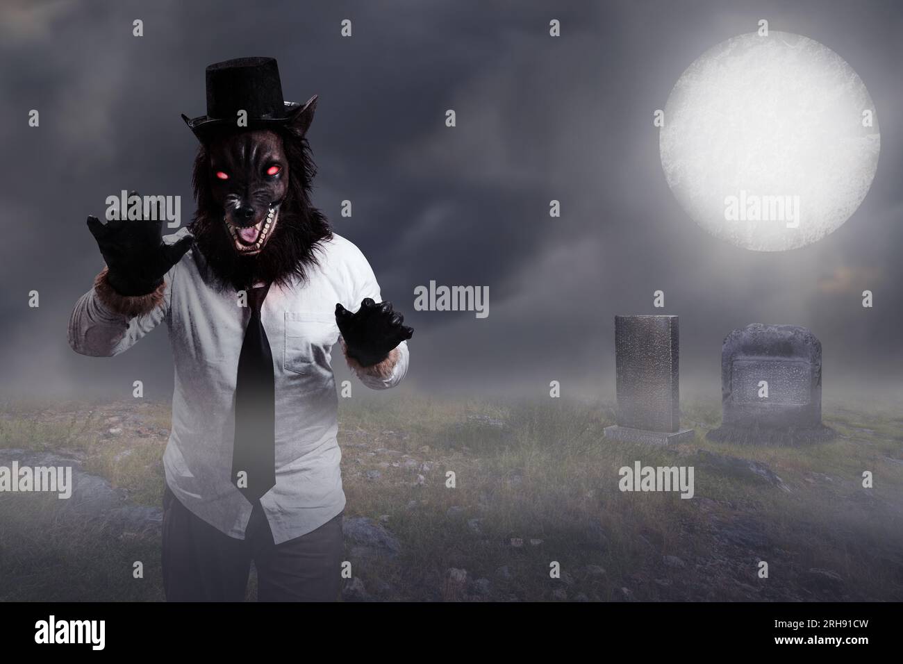 A werewolf in the graveyard with a night scene background. Scary Wolf ...