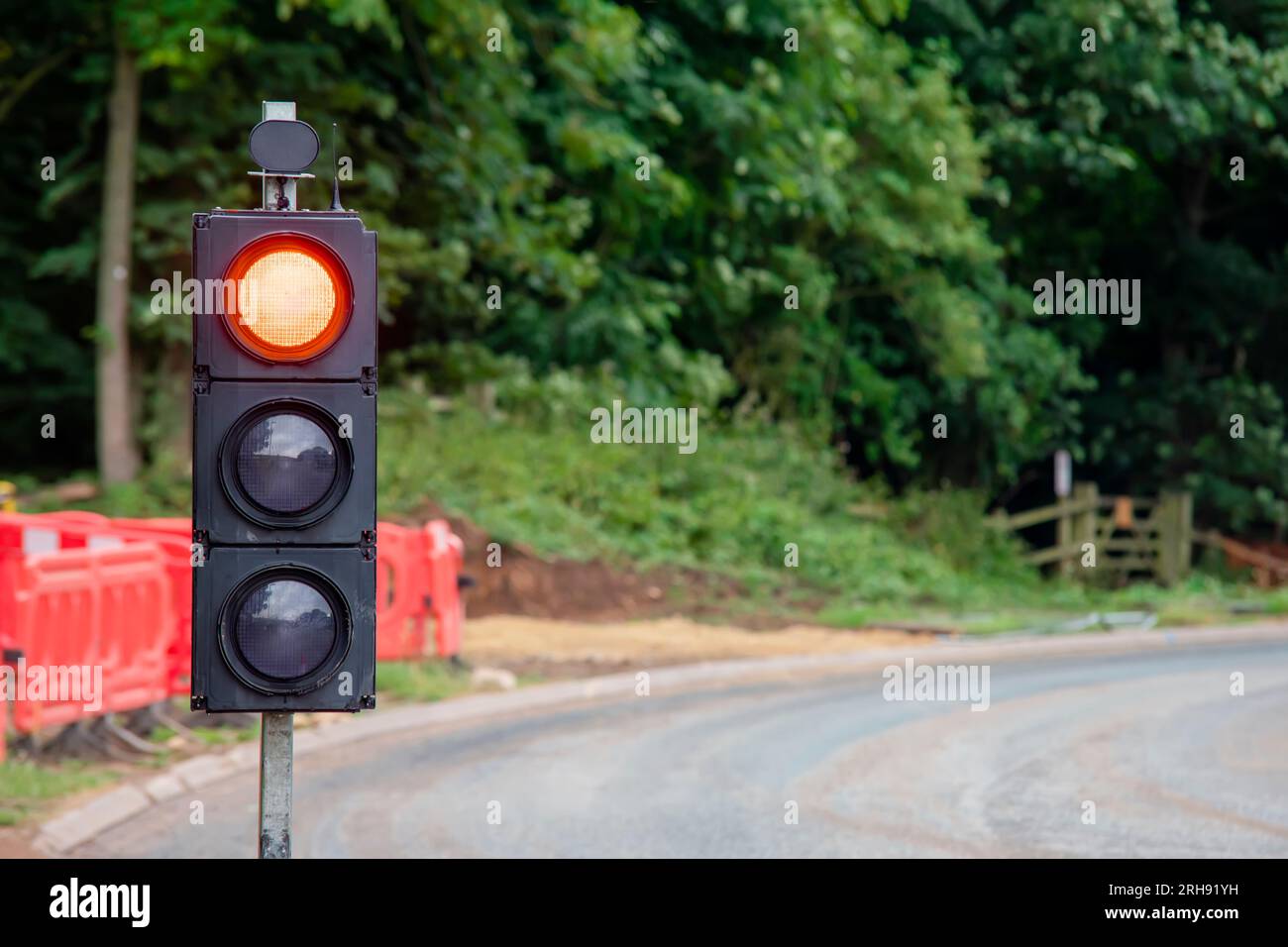 Close-up of temporary portable traffic signal installed for road works ...