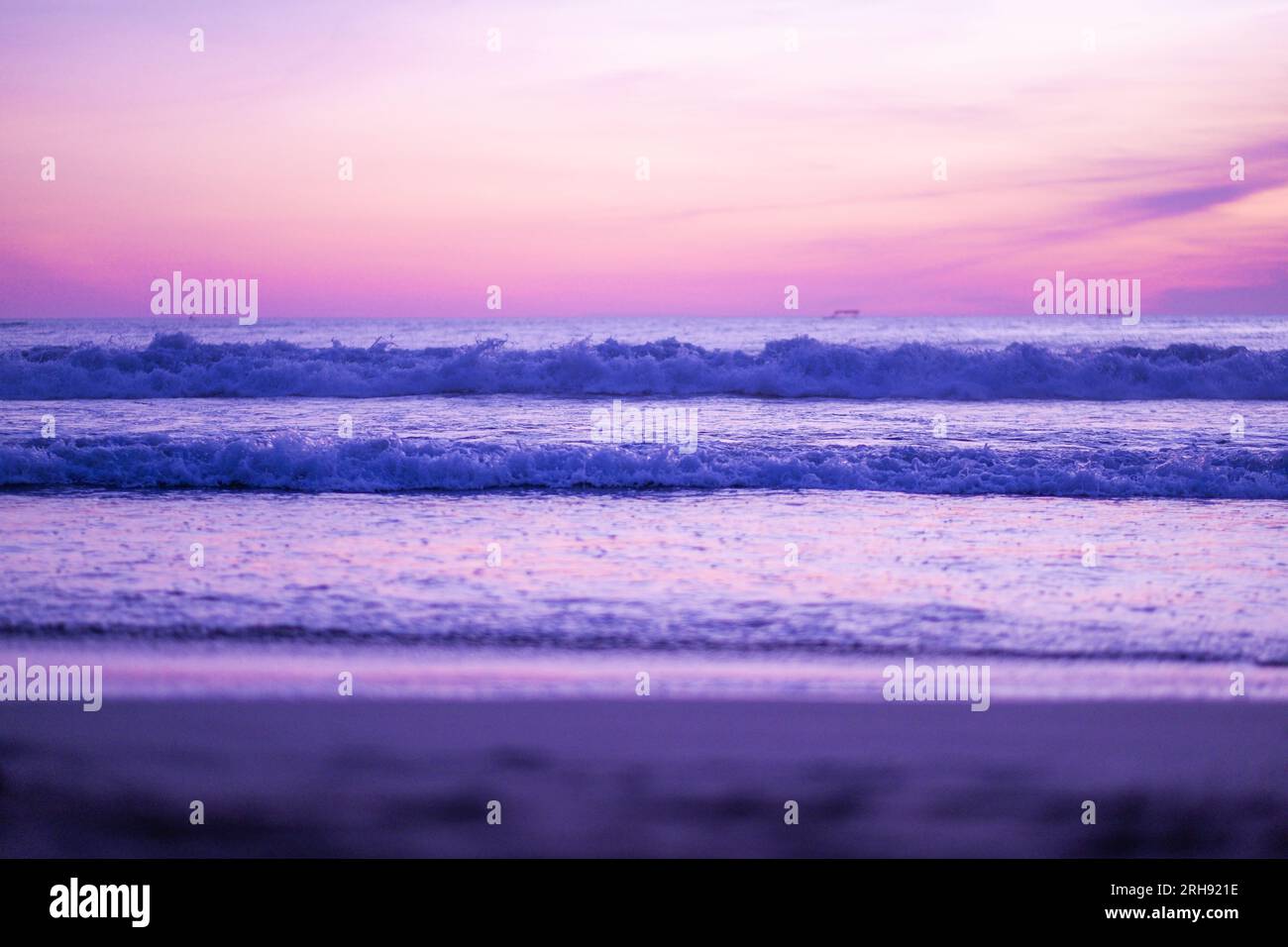 Beautiful sunset at the beach,amazing colors,light beam shining through ...