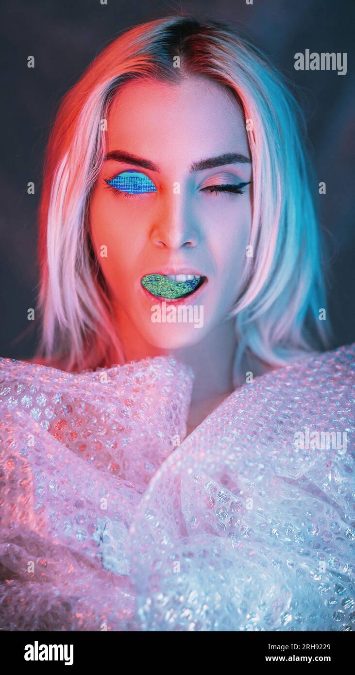 Blue female eye digital glitch hi-res stock photography and images - Alamy