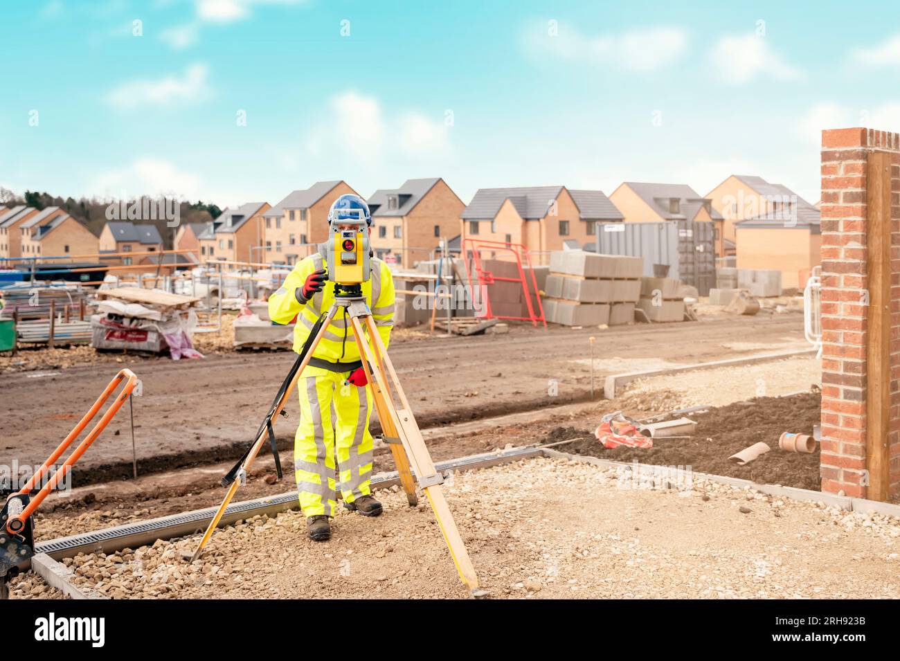Surveyor builder site engineer with theodolite total station at ...