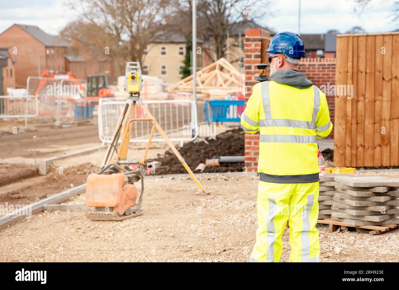 Surveyor builder site engineer with theodolite total station at ...