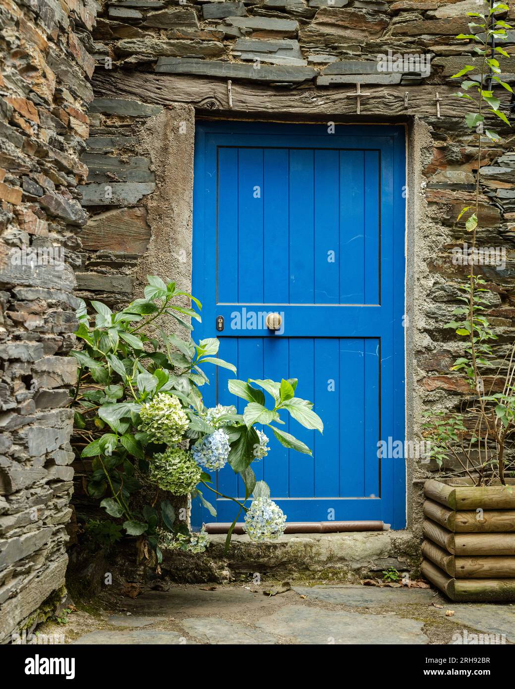 Blue doors of slate houses in historic village in Piodao (Portugal ...