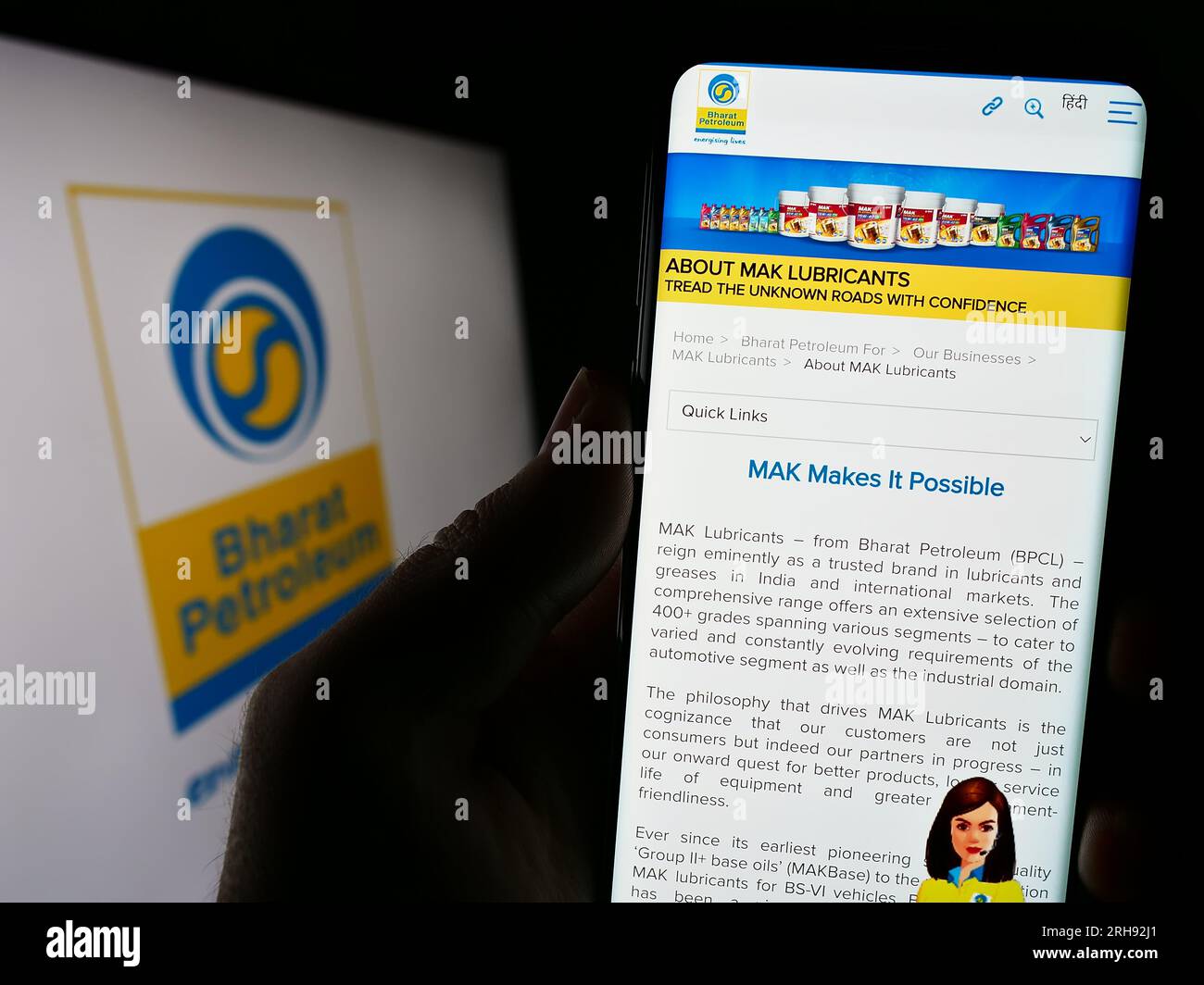 Person holding cellphone with webpage of Bharat Petroleum Corporation ...