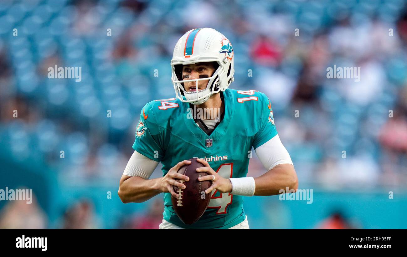 Miami Dolphins quarterback Mike White (14) looks for an open receiver ...