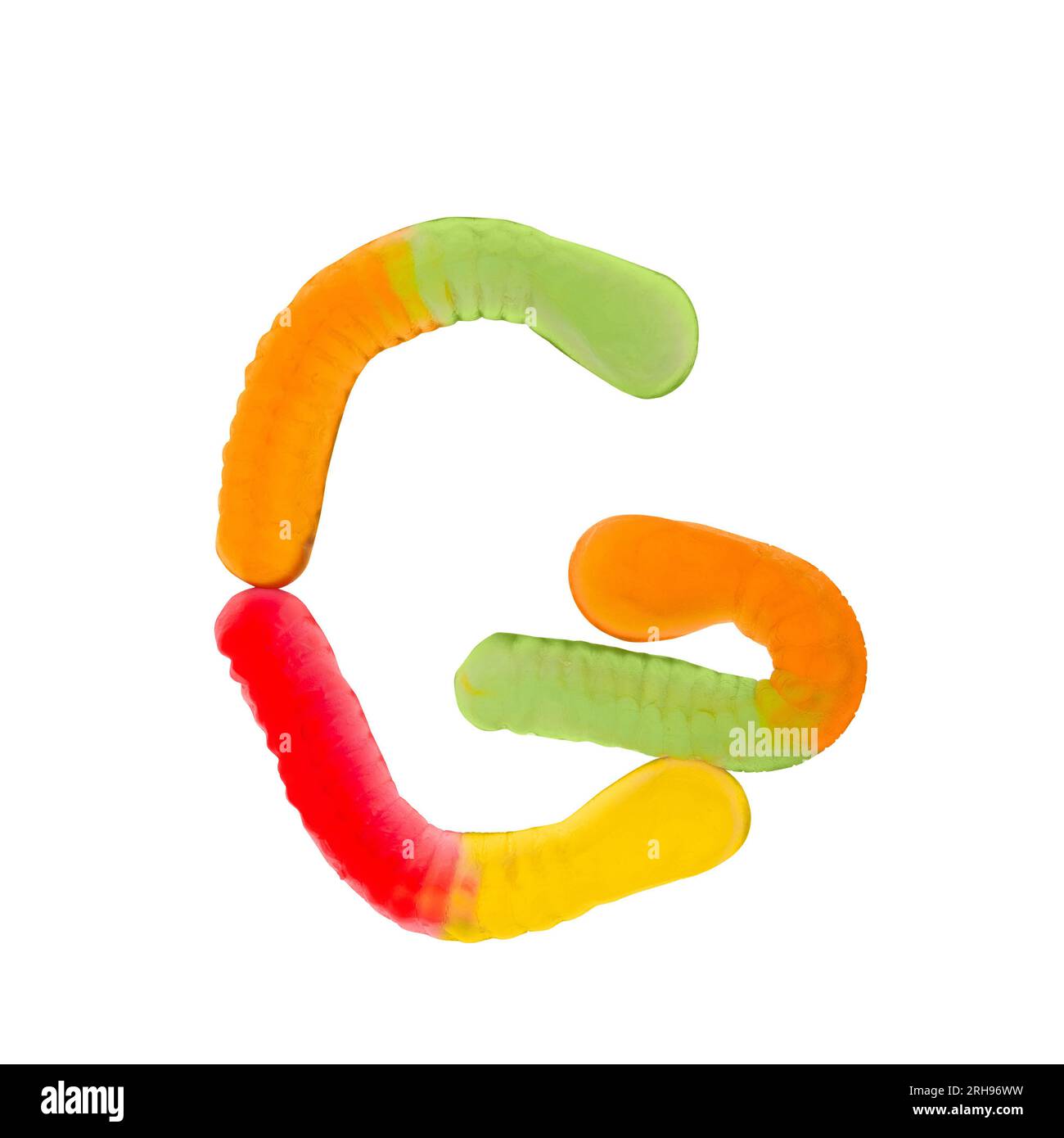 Letter G made of multicolored gummi worms and isolated on pure white ...