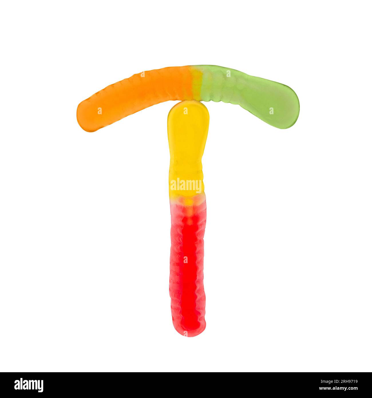 Letter T made of multicolored gummi worms and isolated on pure white ...