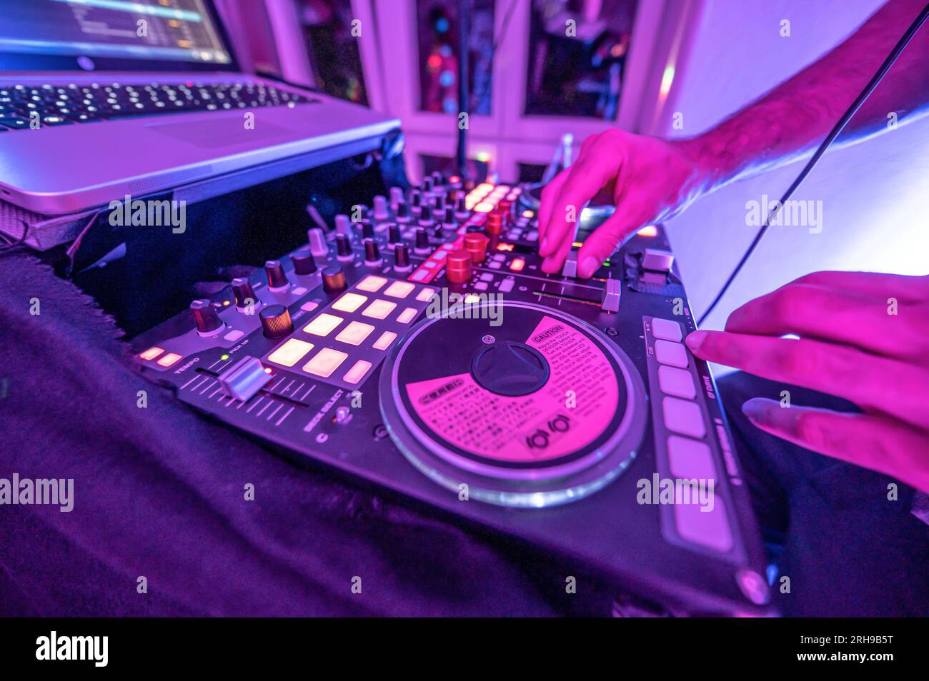 Professional DJ Equipment sound and audio mixer control panel with ...