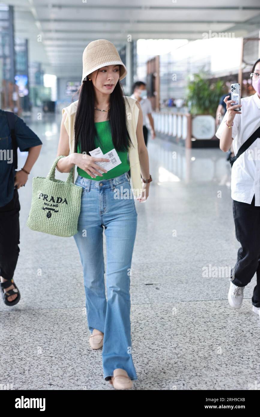 Hong Kong actress and fashion model Janice Man appears at the airport ...