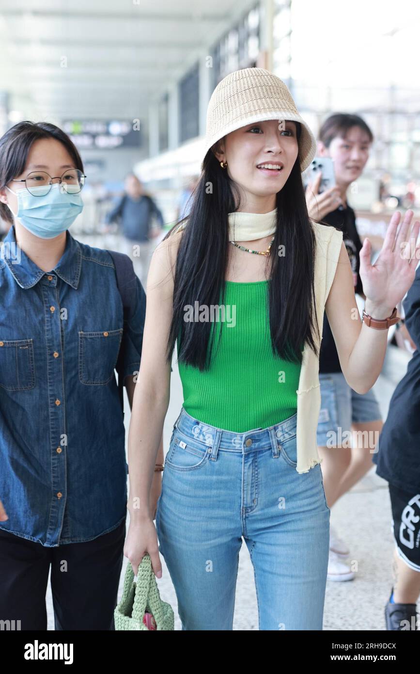 Hong Kong actress and fashion model Janice Man appears at the airport ...