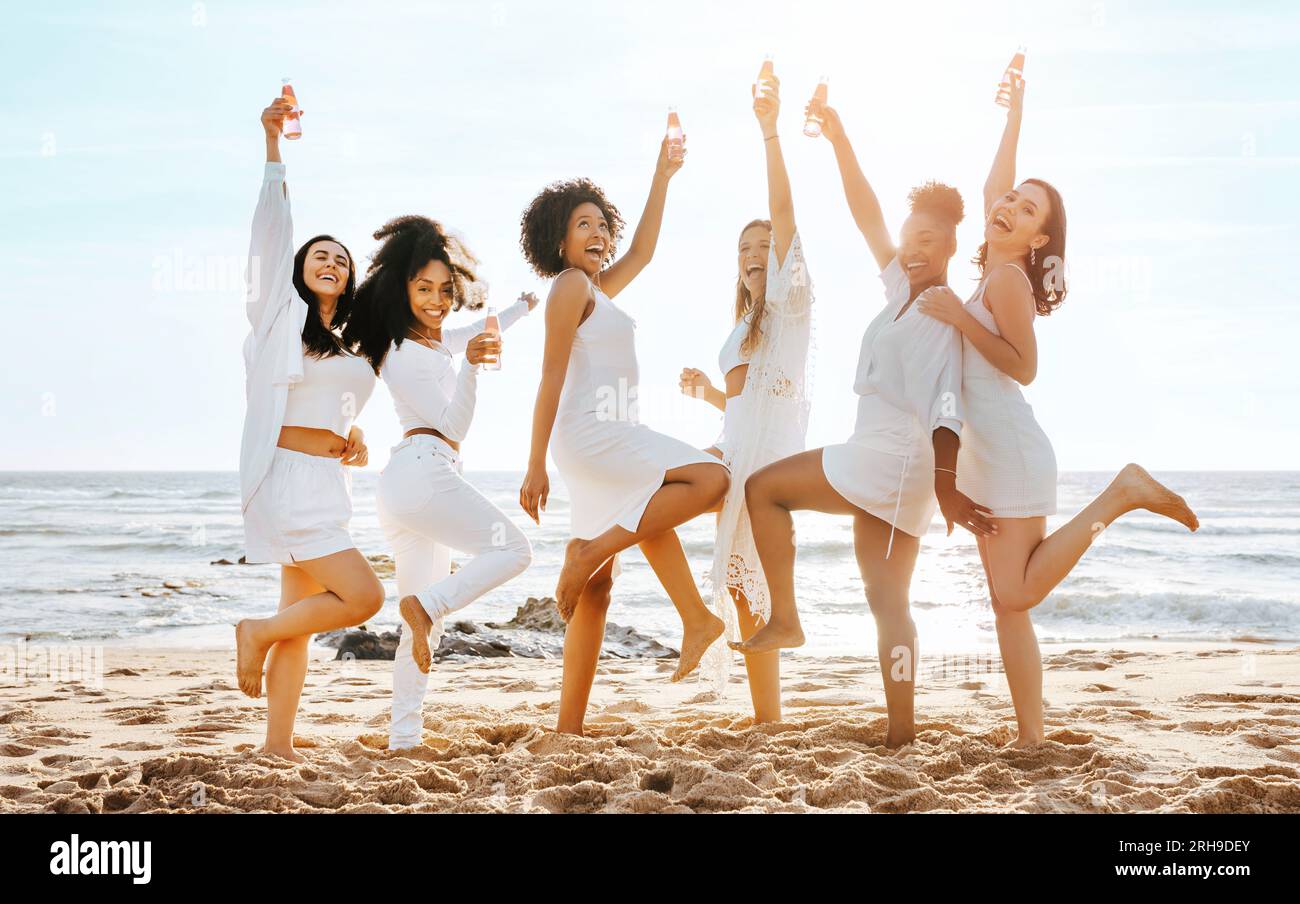 Hen party celebration. Multiracial ladies drinking champagne, hanging ...