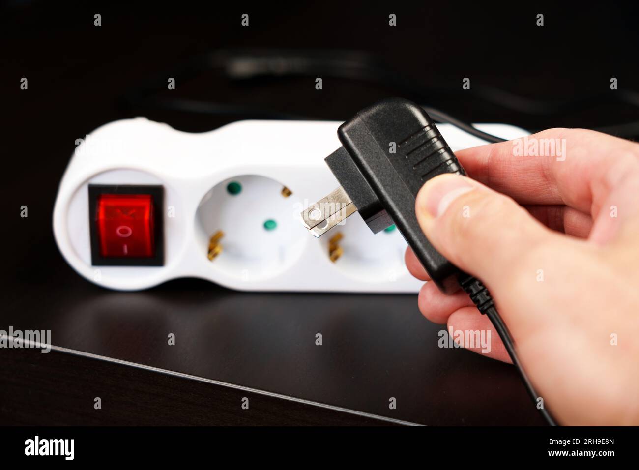 Error plugging an electrical plug into an outlet in a European hotel ...