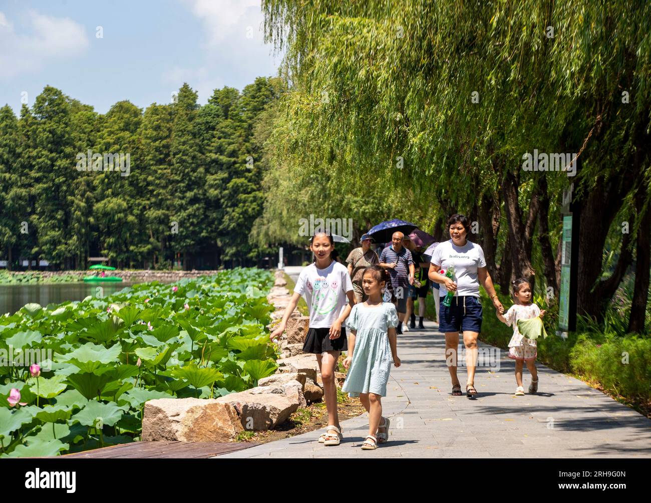 XINGHUA, CHINA - AUGUST 15, 2023 - Tourists visit the Lixiahe National ...