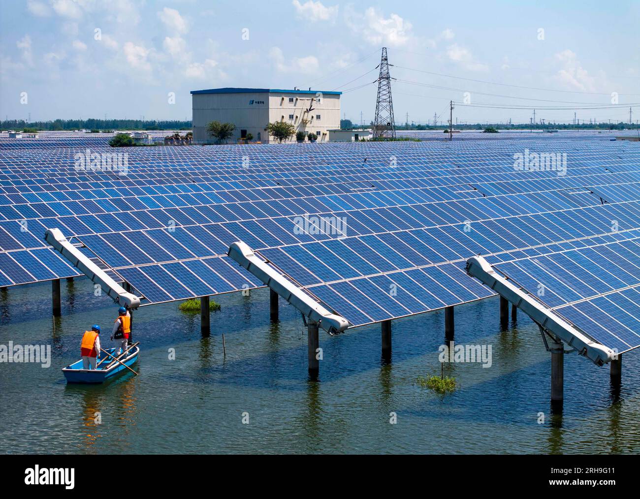 XINGHUA, CHINA - AUGUST 15, 2023 - Electricity volunteers inspect the ...