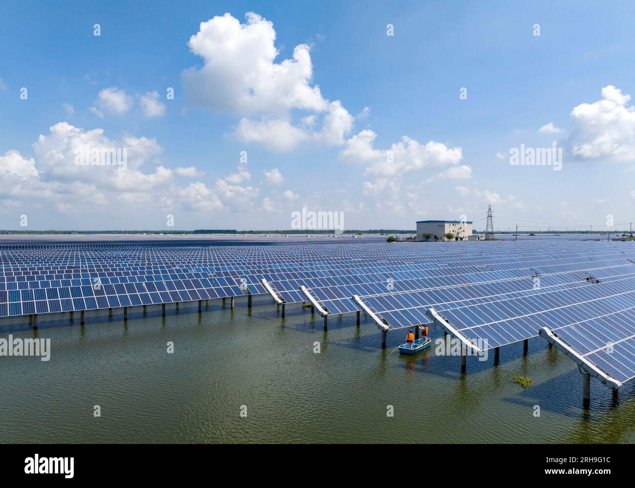 XINGHUA, CHINA - AUGUST 15, 2023 - Electricity volunteers inspect the ...