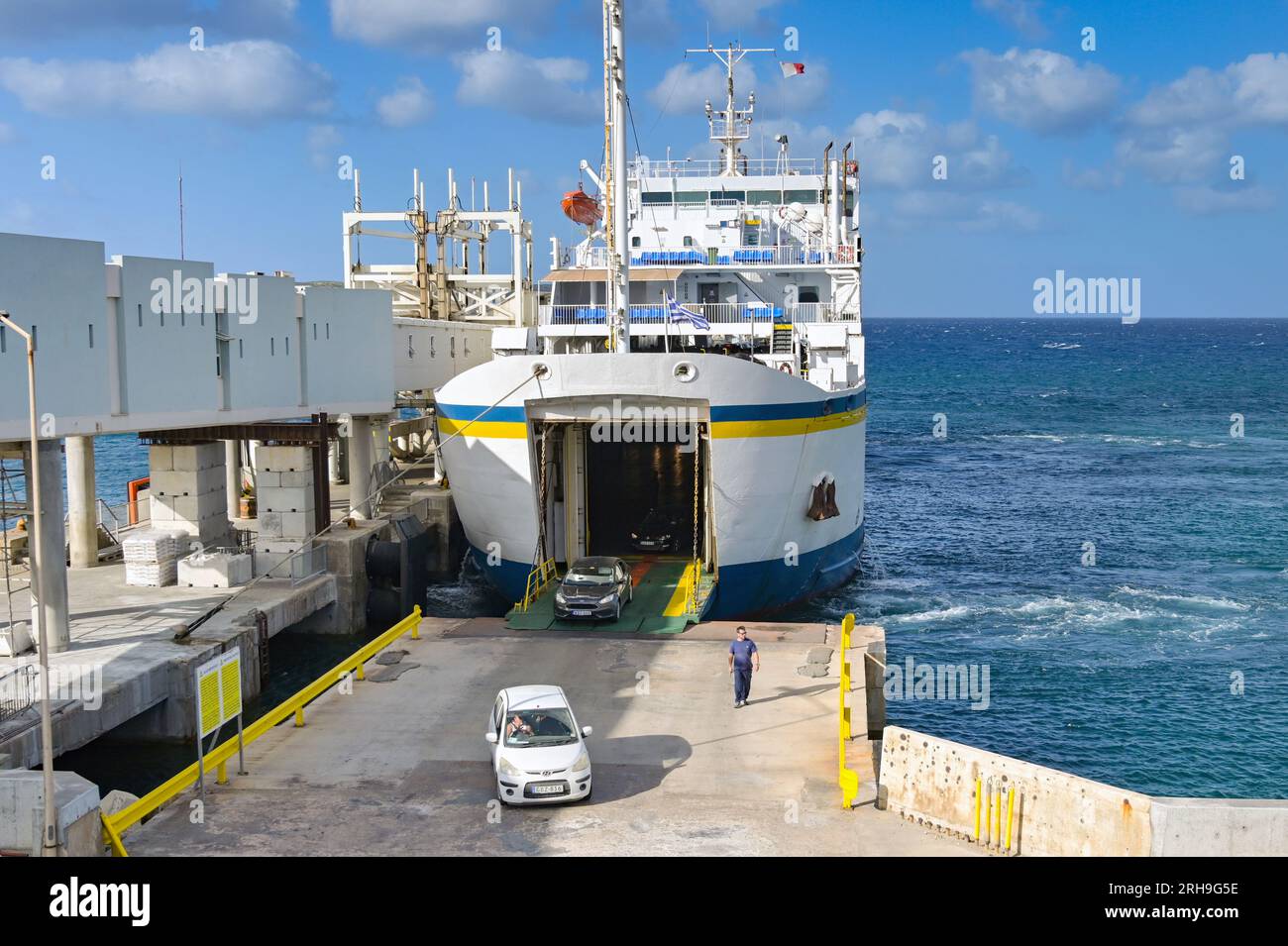 Mellieha, Malta - 5 August 2023: Cars driving off a ferry after ...