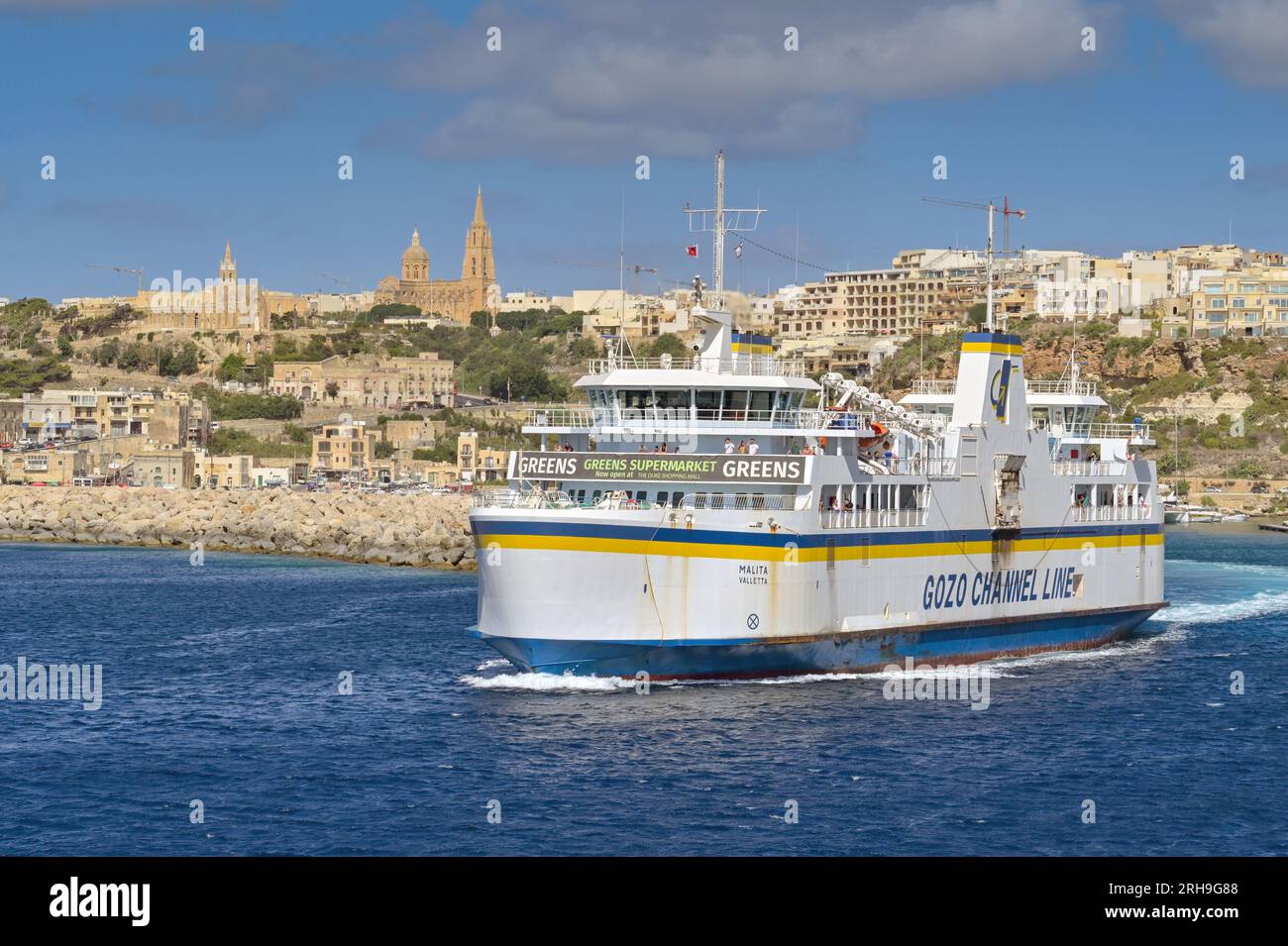 Gozo, Malta - 5 August 2023: Ferry leaving Mgarr harbour taking ...