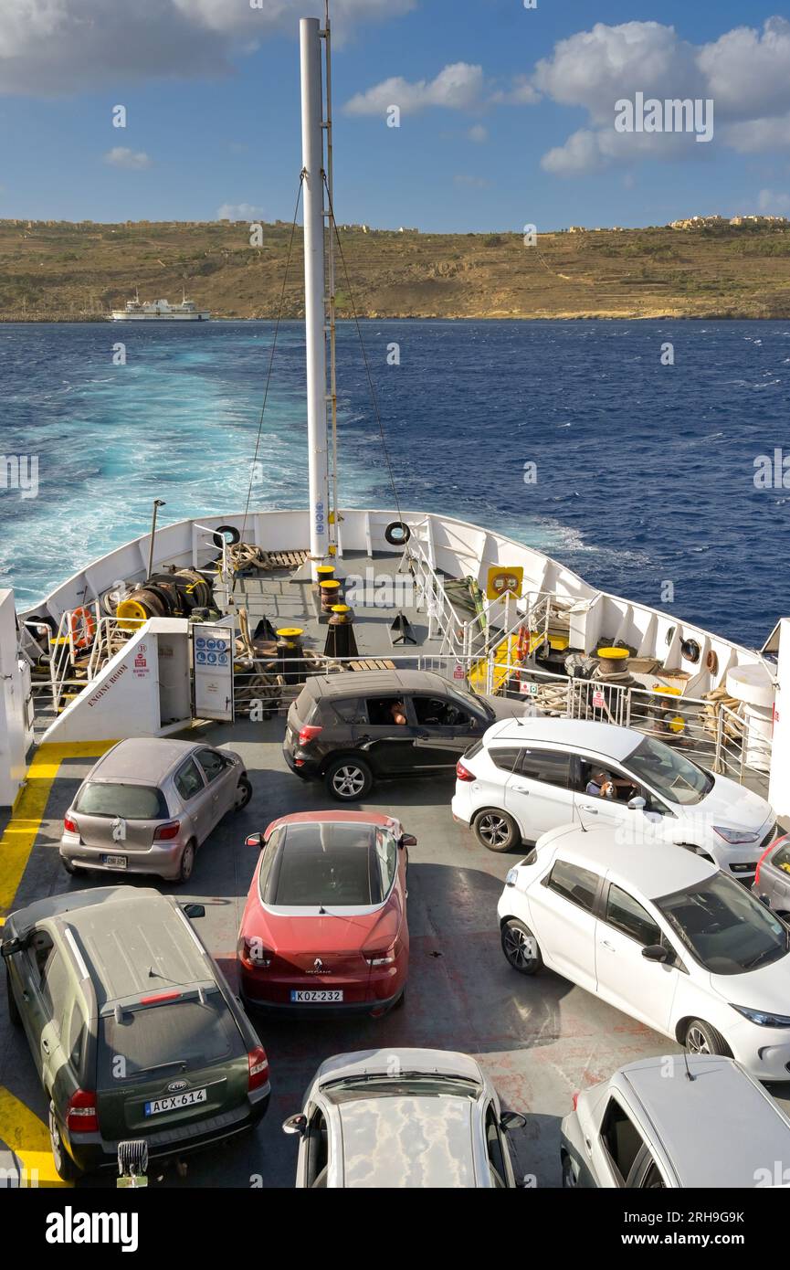 Gozo, Malta - 5 August 2023: Cars on the deck of a ferry sailing ...