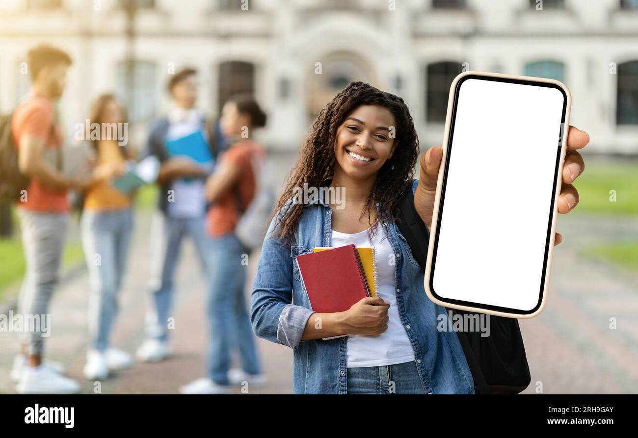 Educational Ad. Smiling Black Female Student Holding Big Blank ...