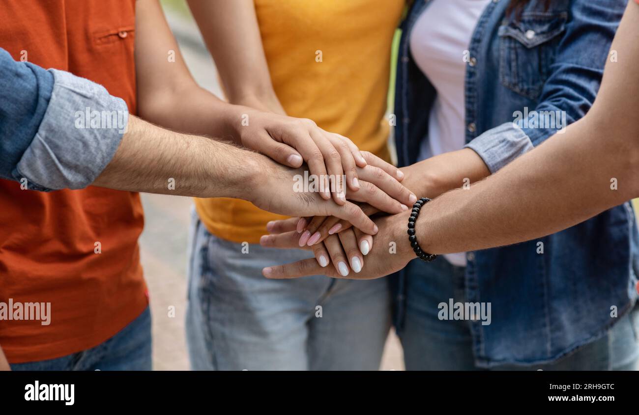 Teamwork Concept. Group Of Young People Joining Hands Together Stock ...
