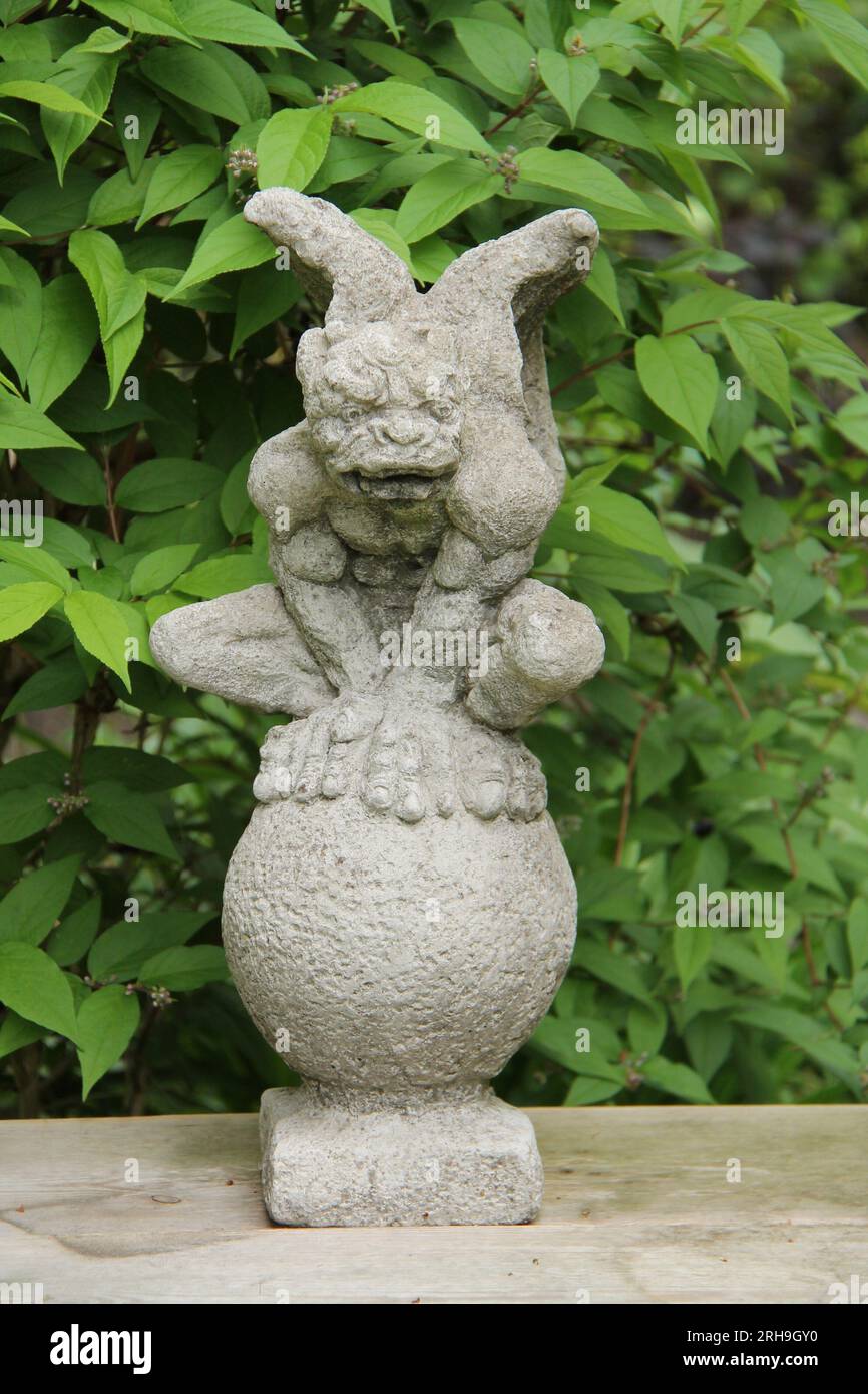 The Ugly Figure of an Ornamental Stone Gargoyle Creature Stock Photo ...
