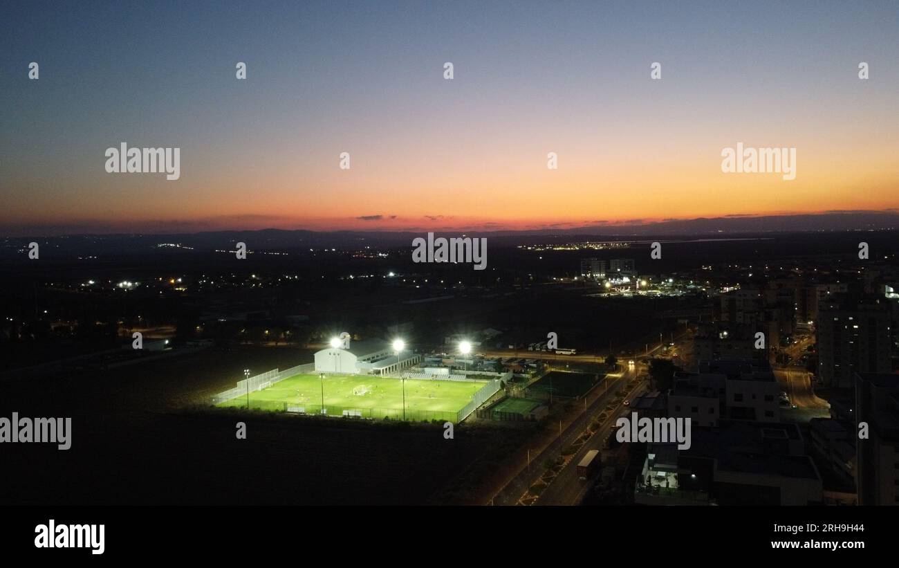 Football court at twilight Stock Photo - Alamy
