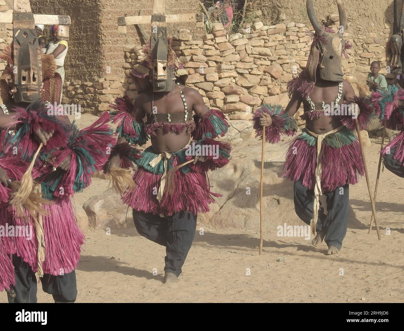 Dogons traditional dance. masked african people dance a traditional ...