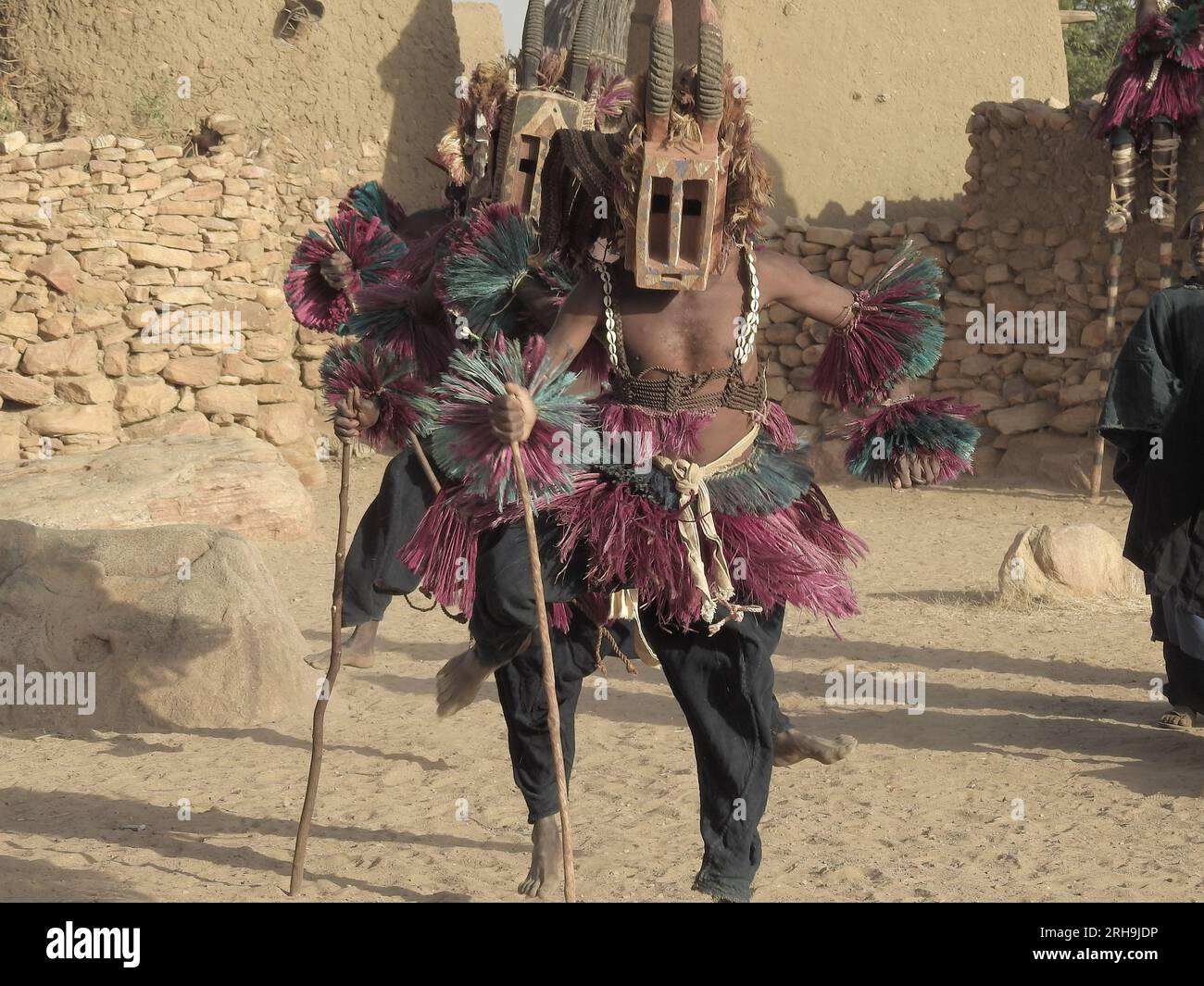 Dogons traditional dance. masked african people dance a traditional ...