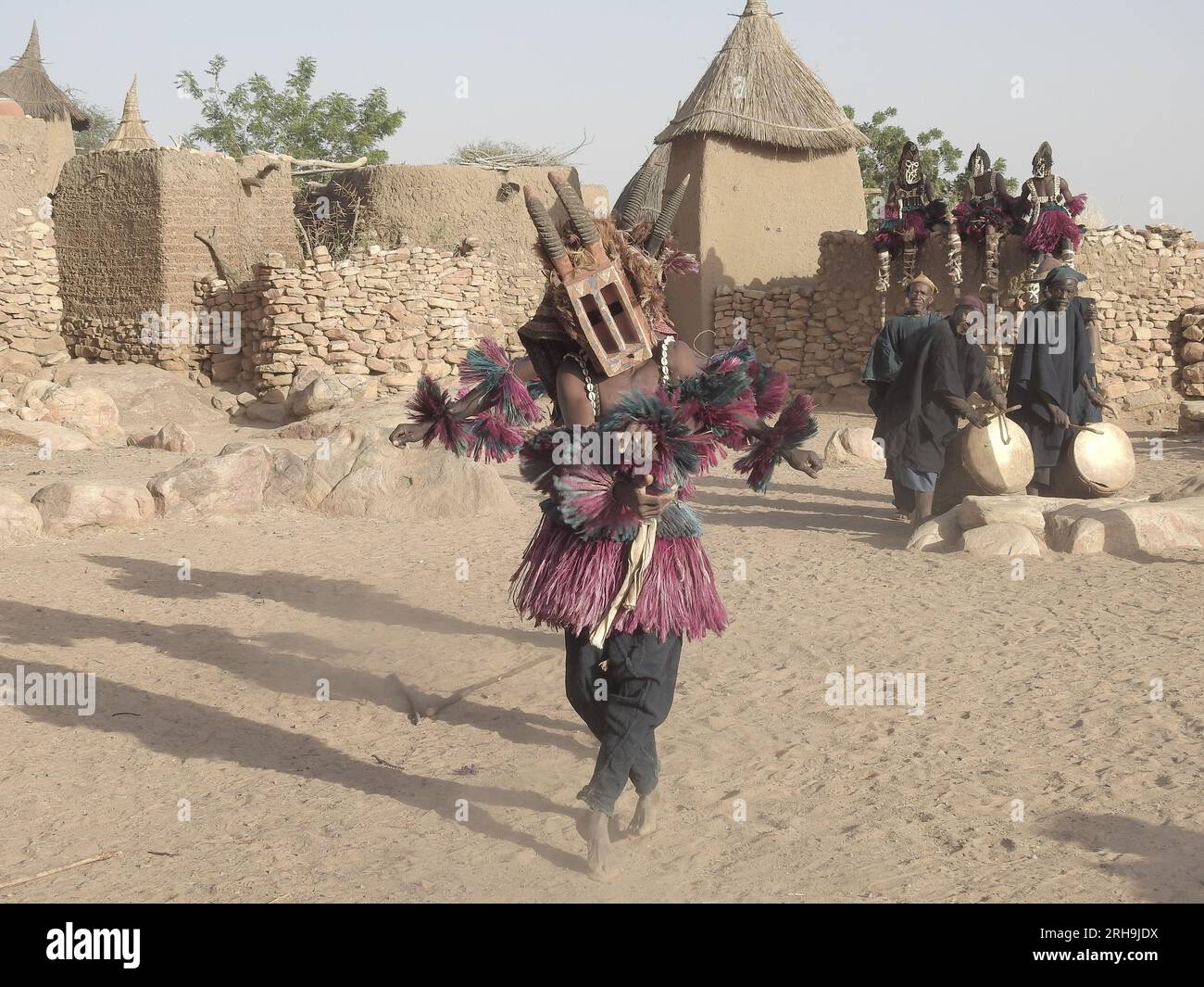 Dogons traditional dance. masked african people dance a traditional ...