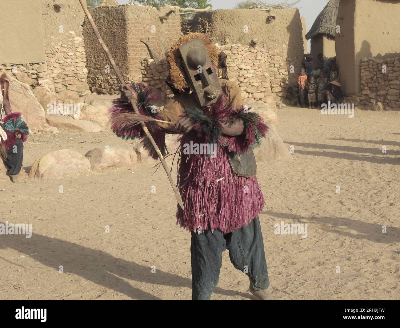 Dogons traditional dance. masked african people dance a traditional ...
