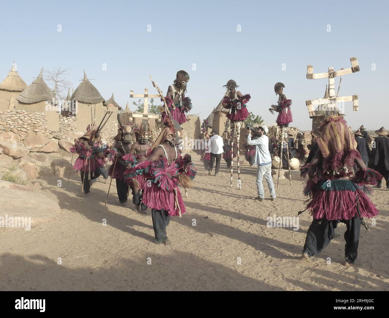 Dogons traditional dance. masked african people dance a traditional ...