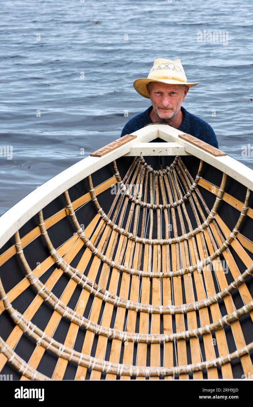 Hugh McMahon with his traditional hand built currach boat, Ardara ...