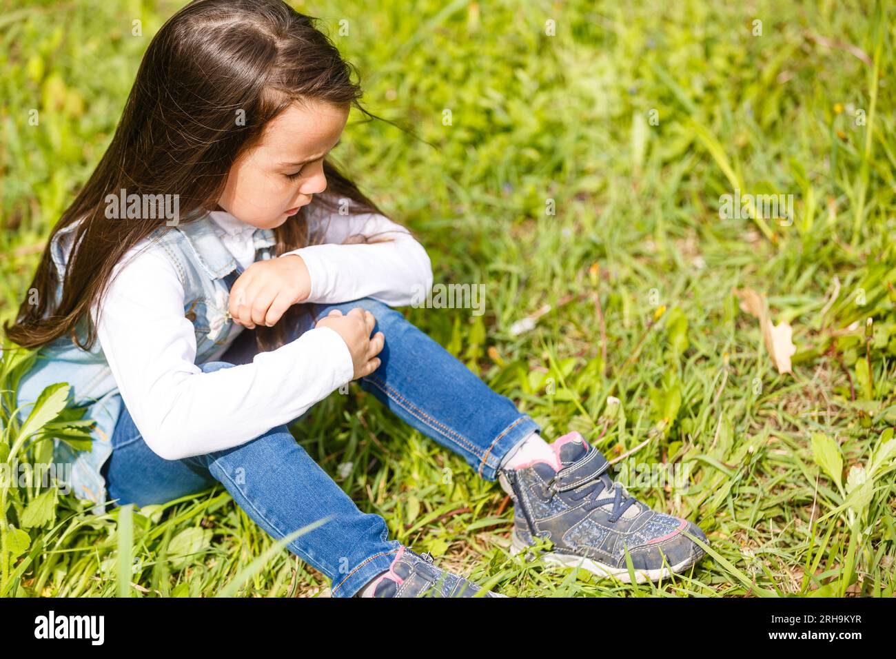 Beautiful sad little girl crying, on summer background Stock Photo - Alamy