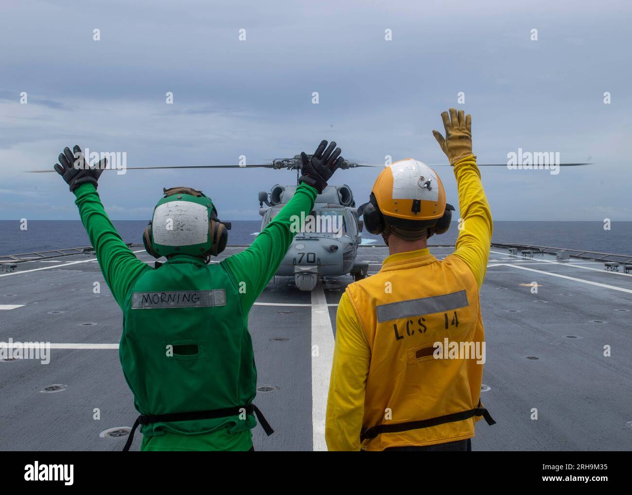 An MH-60S Sea Hawk on the flight deck USS Manchester, Pacific Ocean ...