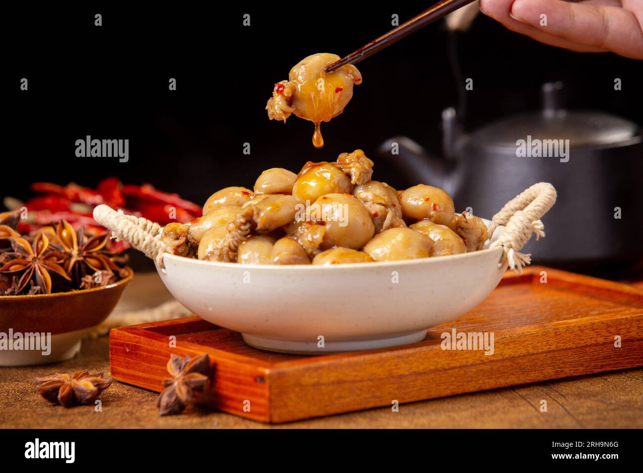 Marinated Baby Cuttlefish in Spiced Sauce Stock Photo - Alamy